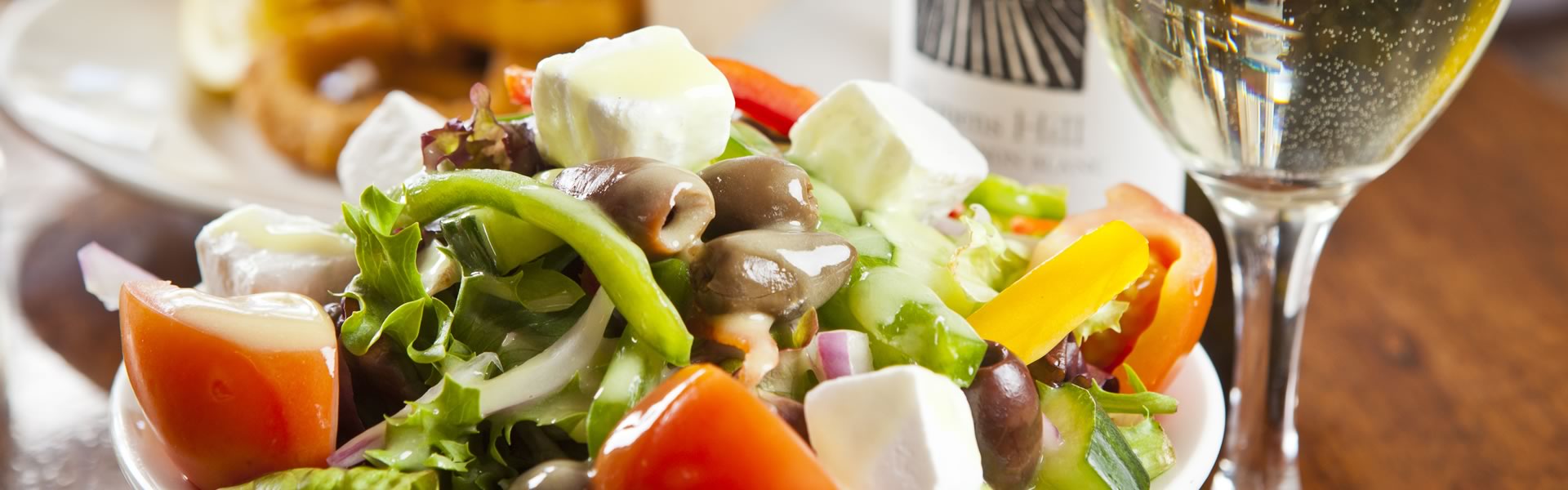 Our menu – fish ’n’ chips, seafood, salad options and specials board ...